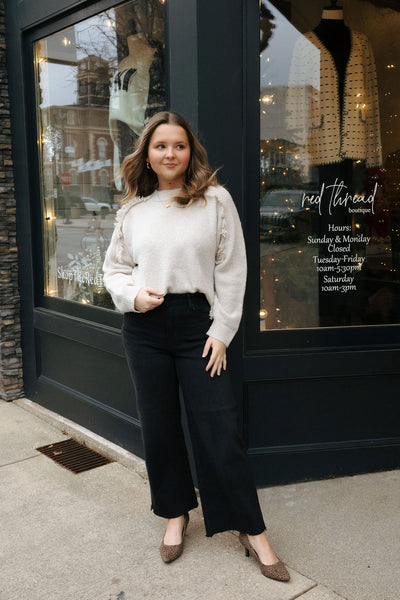 The Red Thread Boutique, a women's clothing store